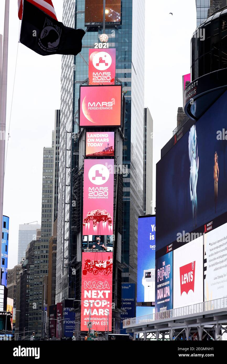 Jumbotron in Times Square displays the announcement of the landing of ...