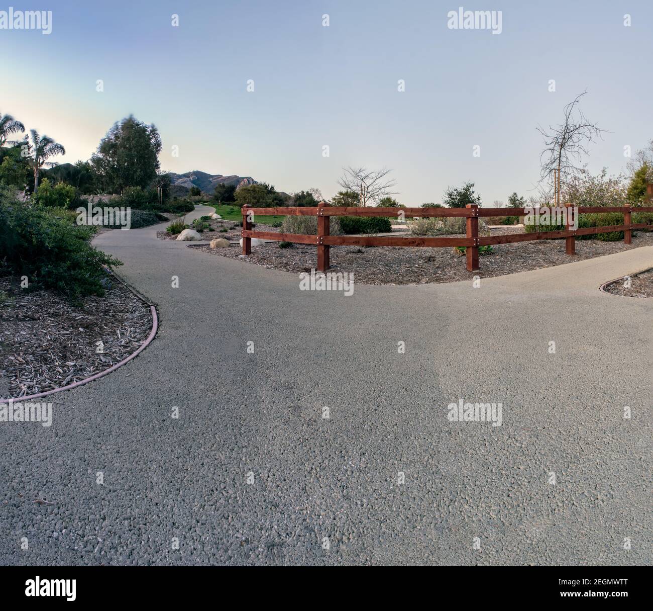 Fork in the community park trail gives the choice to go either left or ...