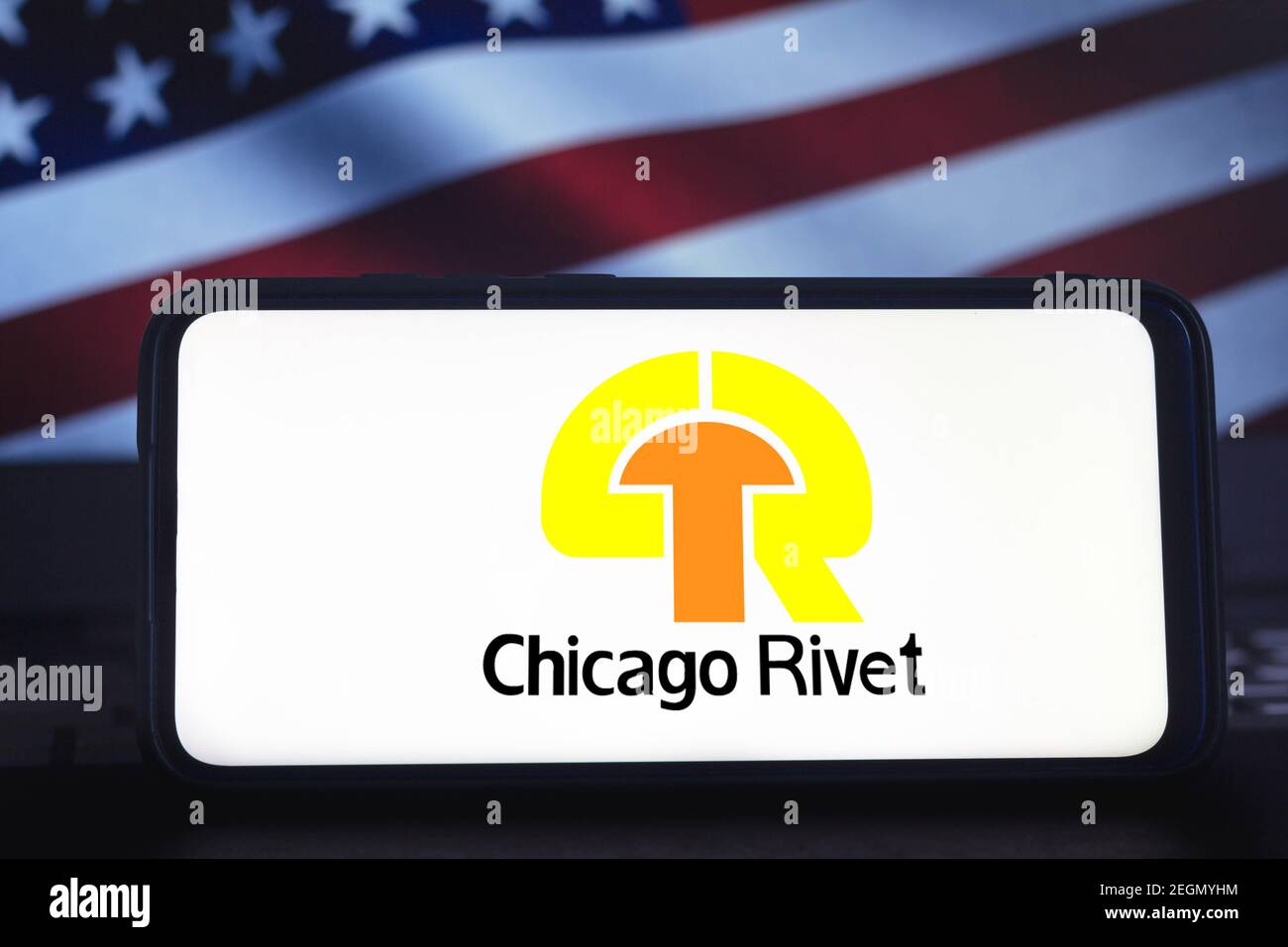 In this photo illustration a Chicago Rivet and Machine logo seen ...
