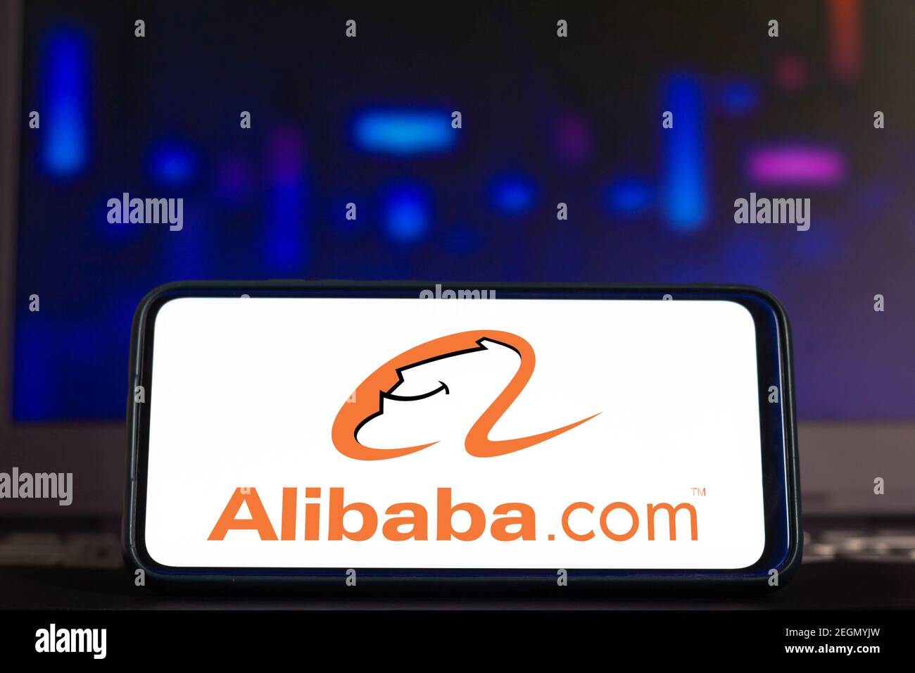 In this photo illustration an Alibaba.com logo seen displayed on a ...