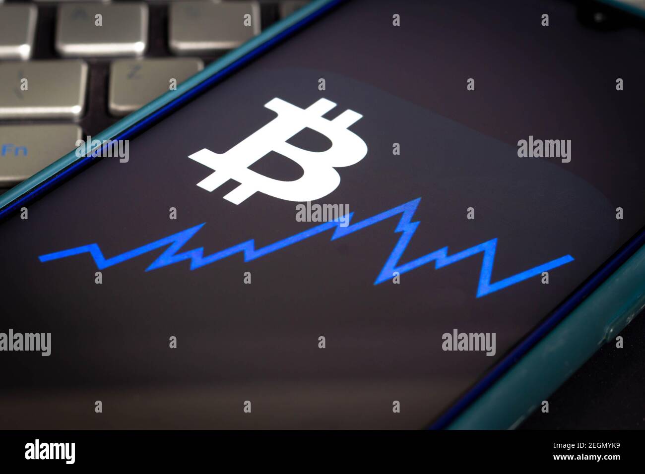 In this photo illustration a Bitcoin logo seen displayed on a ...
