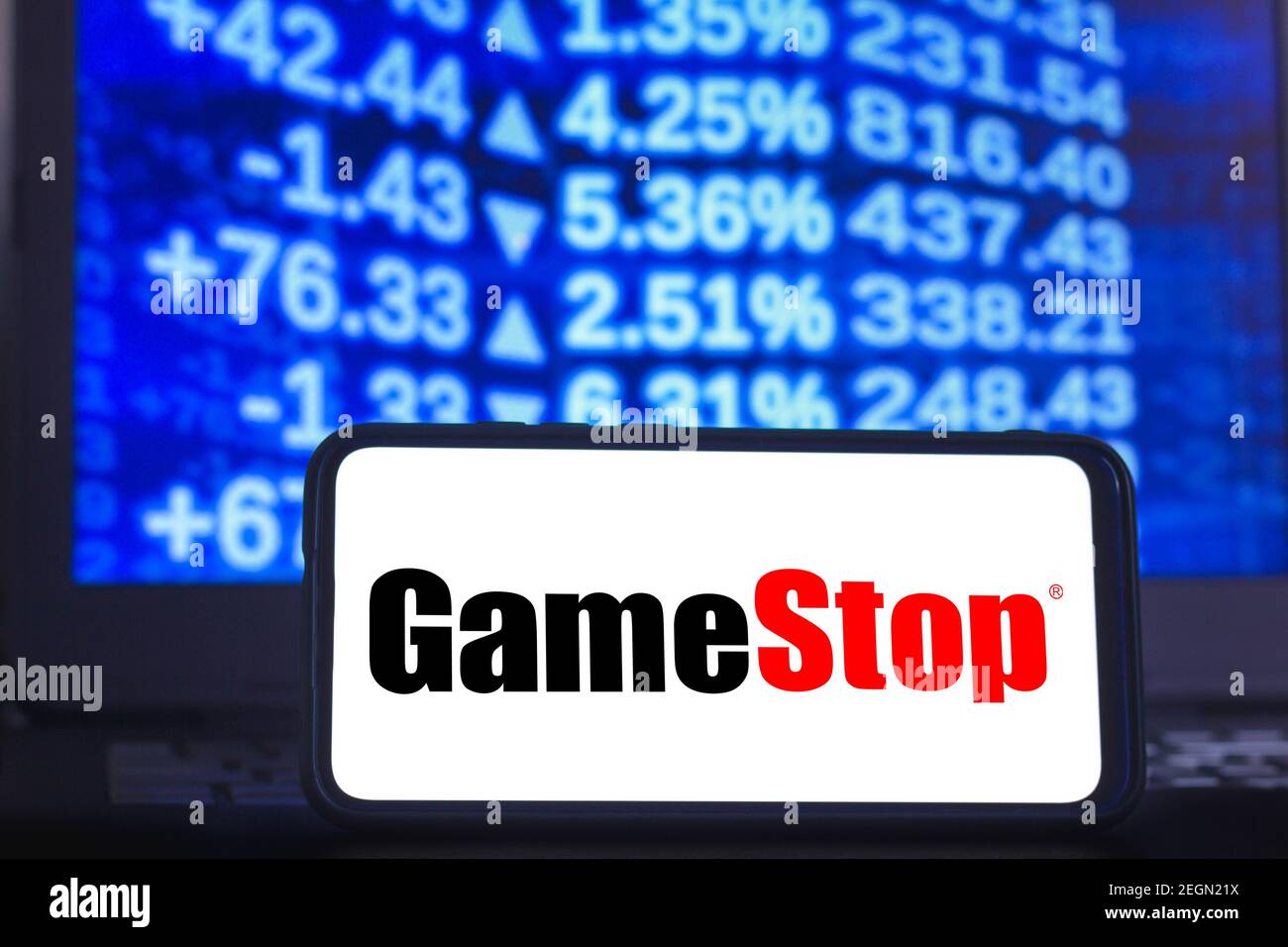 In this photo illustration a GameStop logo seen displayed on a ...