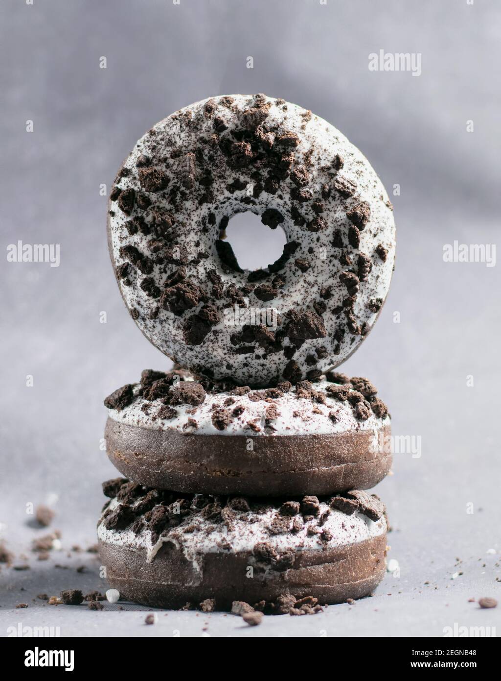 Three ring donuts with chocolate pieces Stock Photo - Alamy