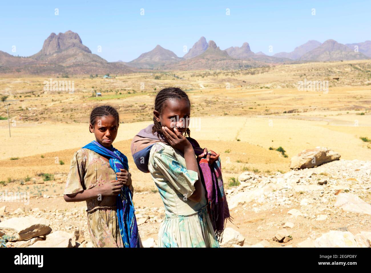 Ethiopian girls standing along the road in the Tigray region of ...