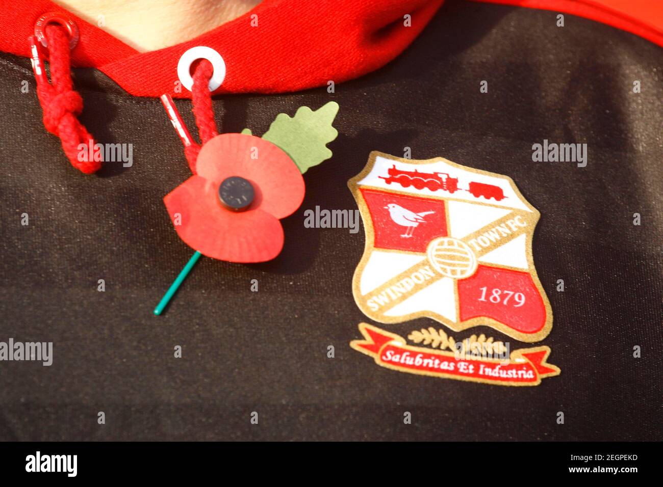Football action poppy hi-res stock photography and images - Alamy