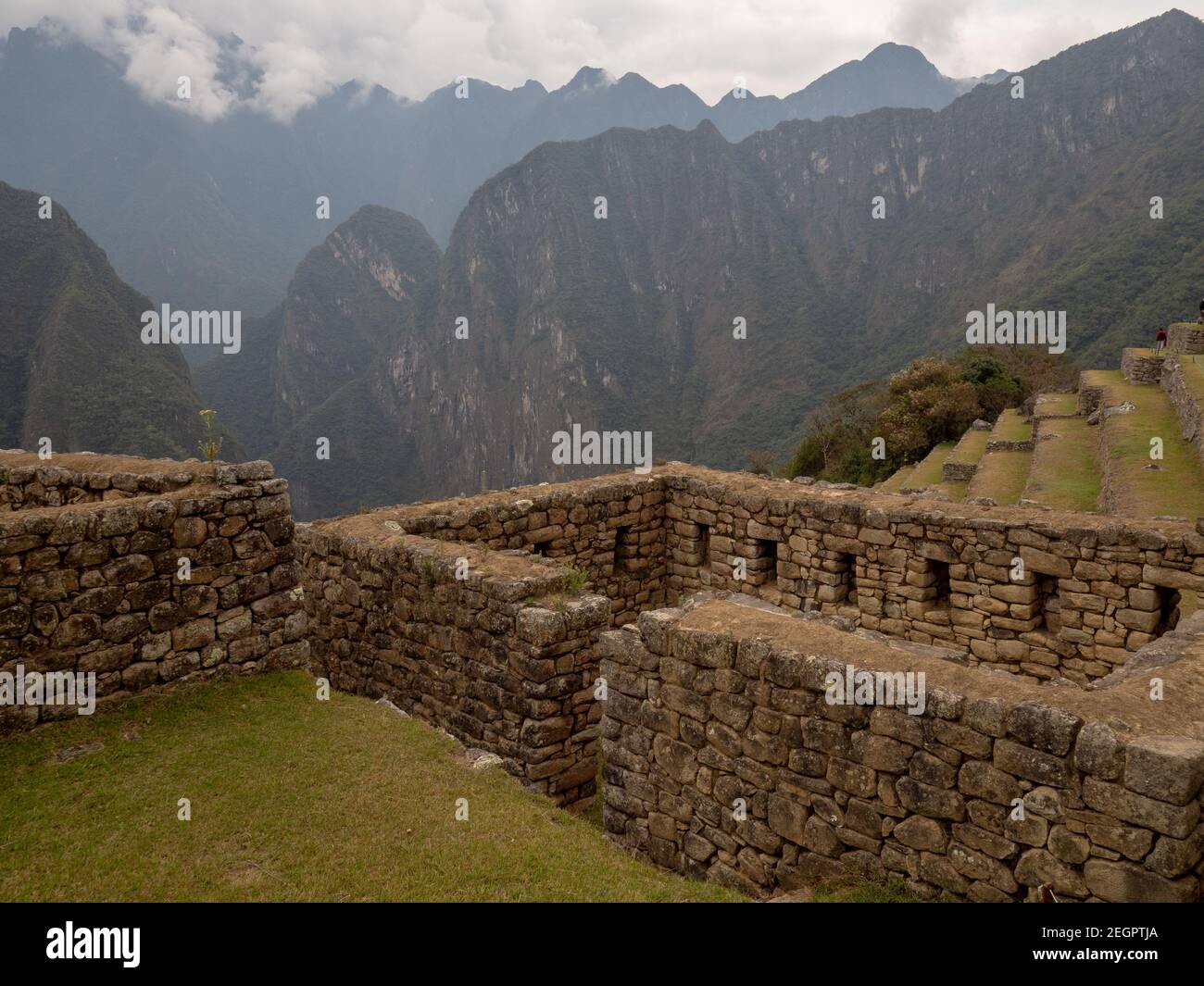 Inca stone houses up in the andes at Machu Picchu, nice view of ...