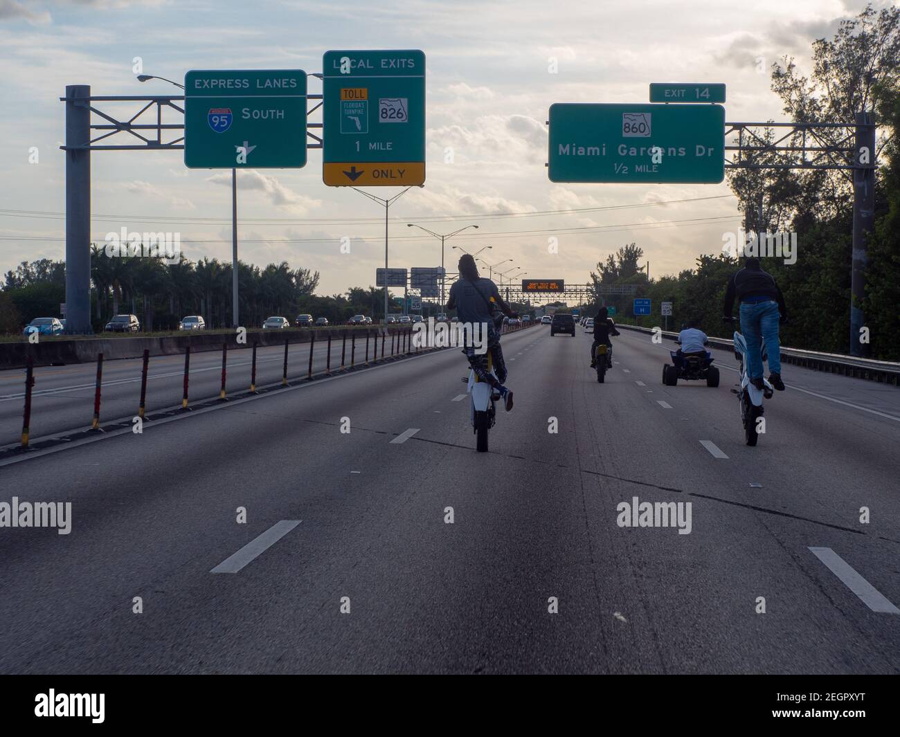 USA, Miami Gardens - December 15, 2019 - four motorcycle riders on ...