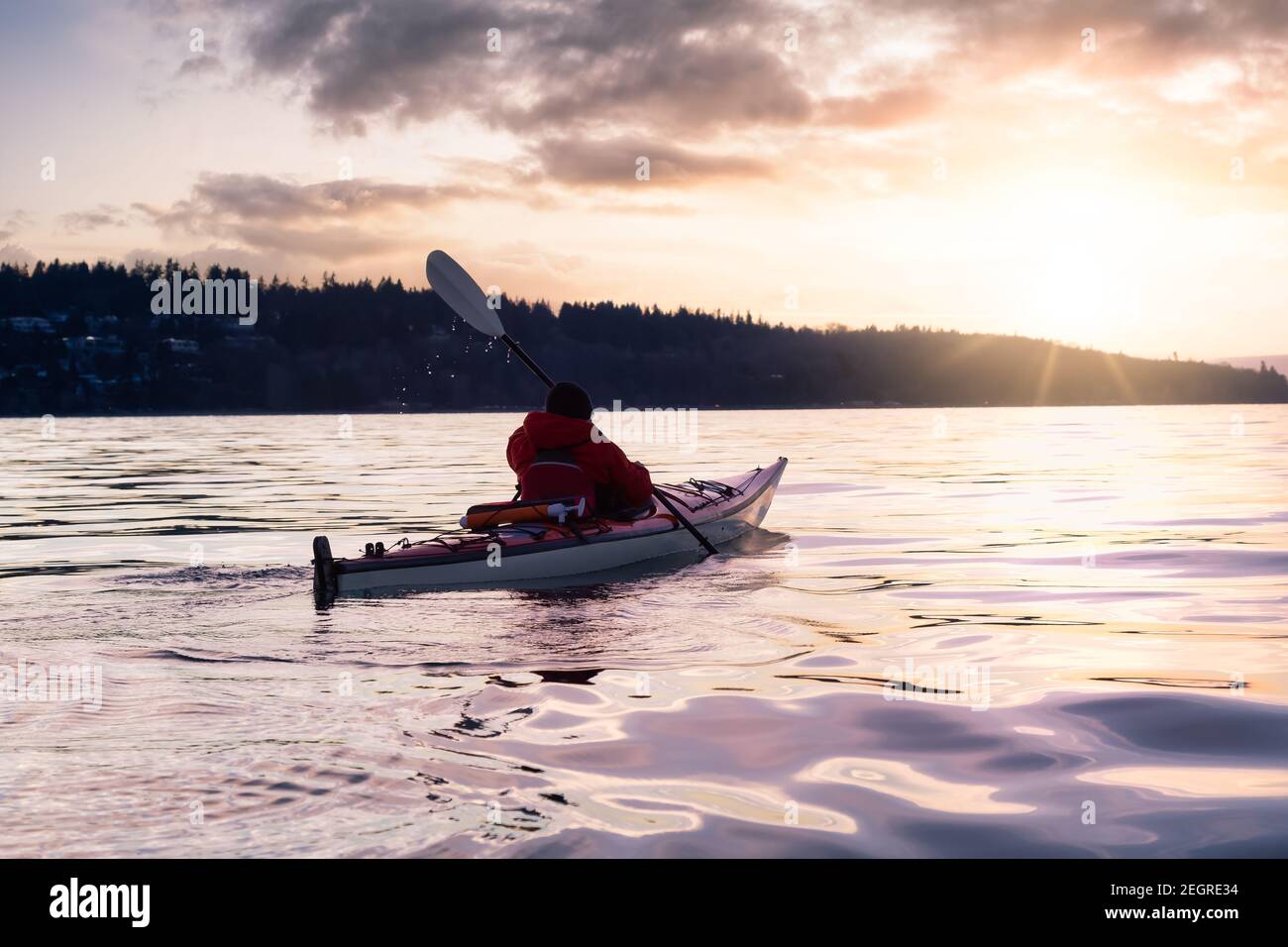 Adventurous Man Sea Kayaking in the Pacific Ocean Stock Photo - Alamy