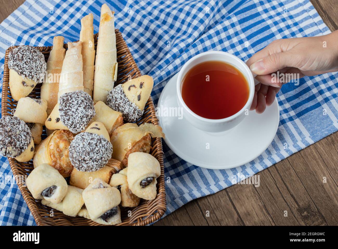 Variety of cookies in the platter with a cup of tea aside Stock Photo ...