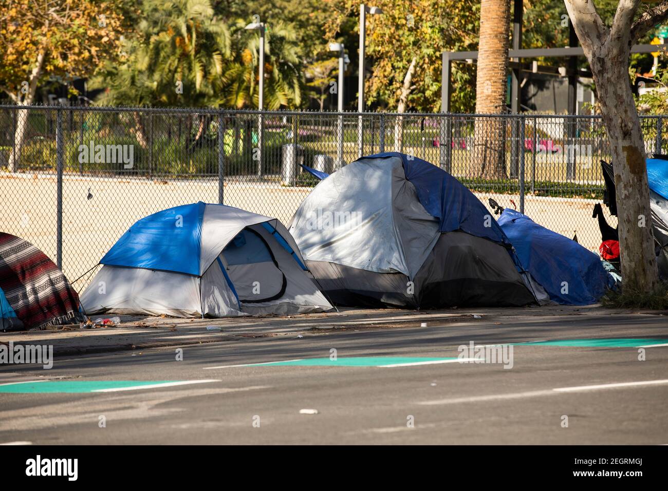 A homeless encampment sits on a street in Downtown Los Angeles ...