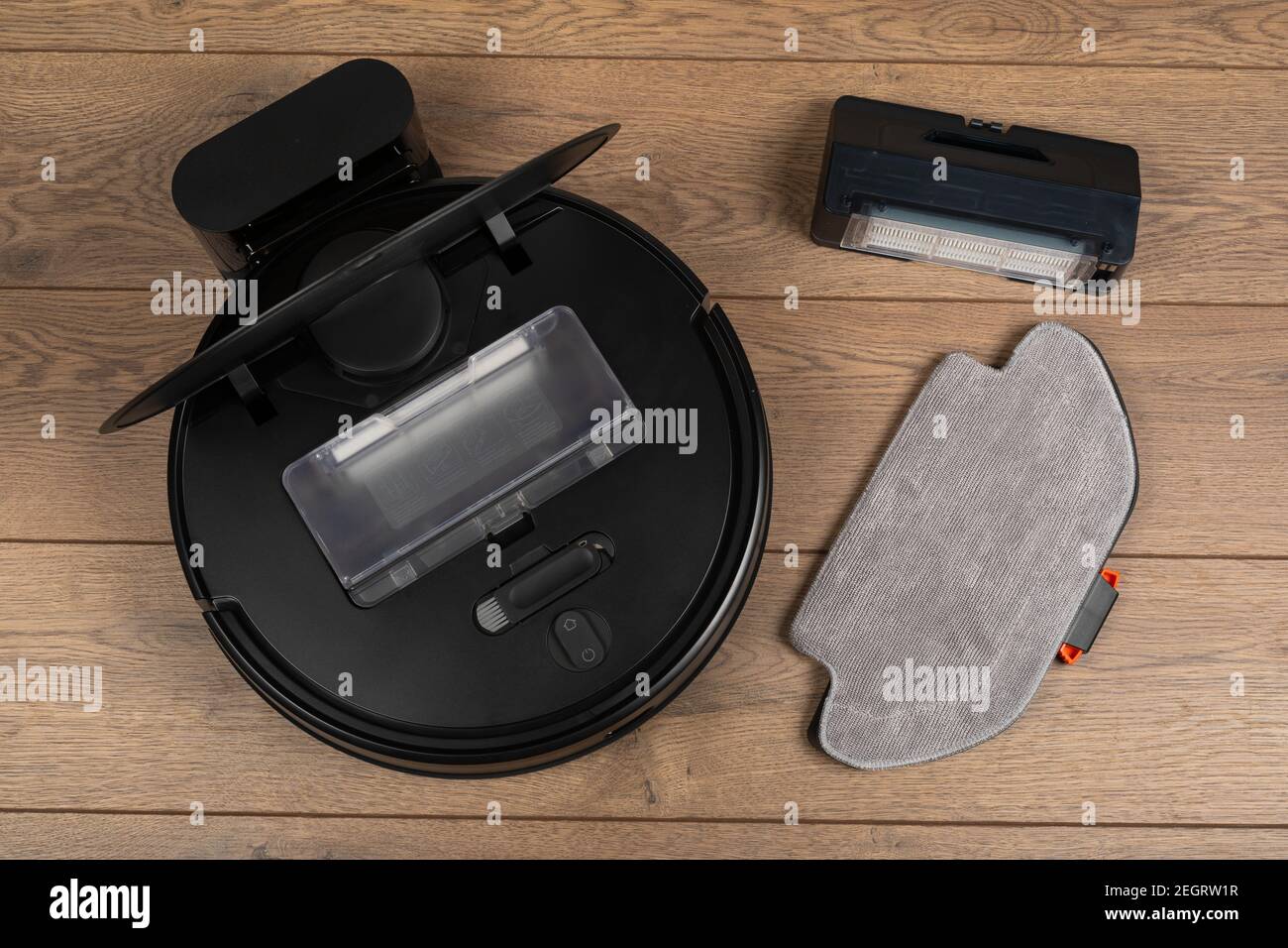 Picture of an automatic intelligent robotic vacuum cleaner with mop on ...