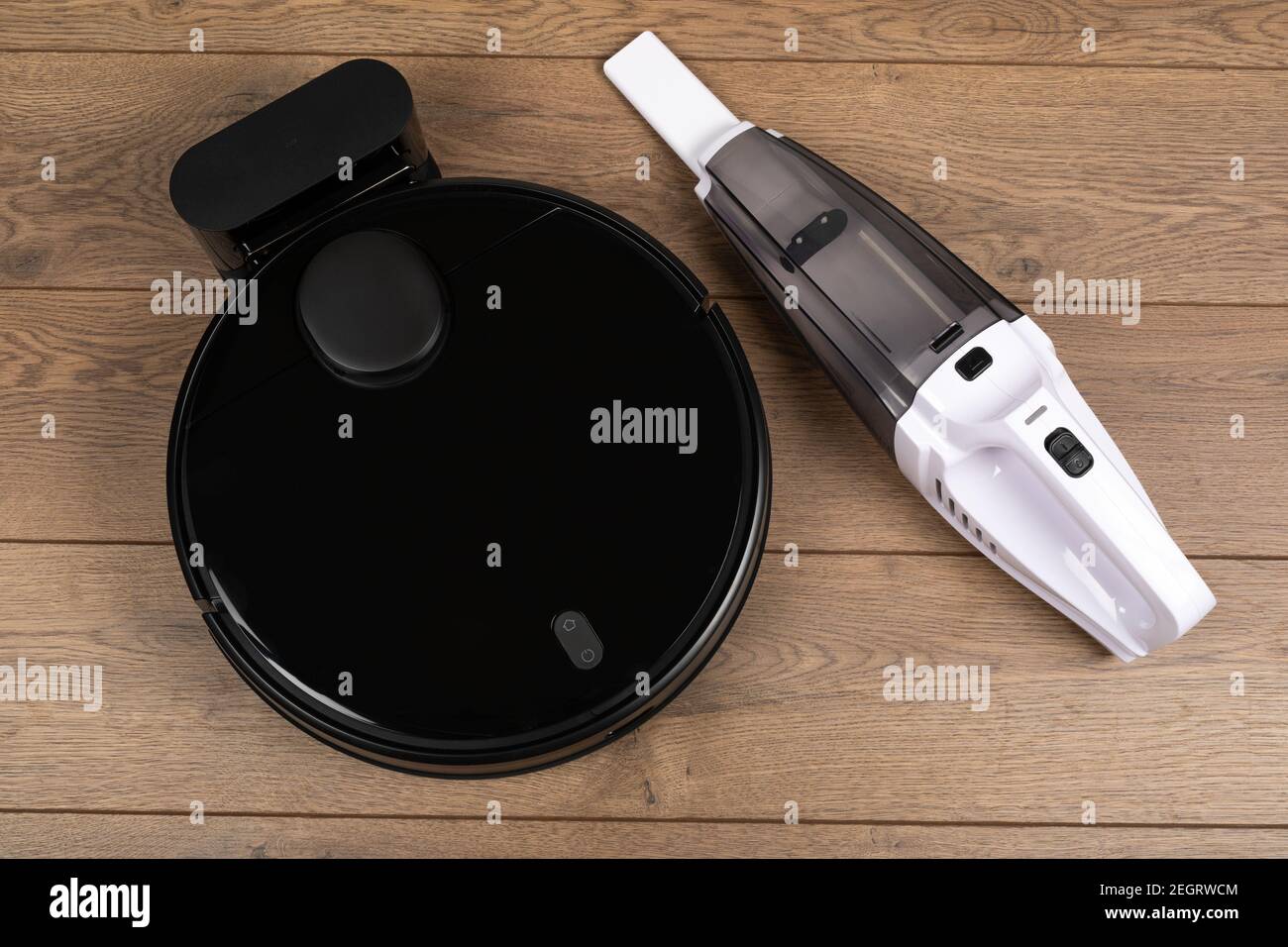 Picture of an automatic intelligent robotic vacuum cleaner on the floor ...