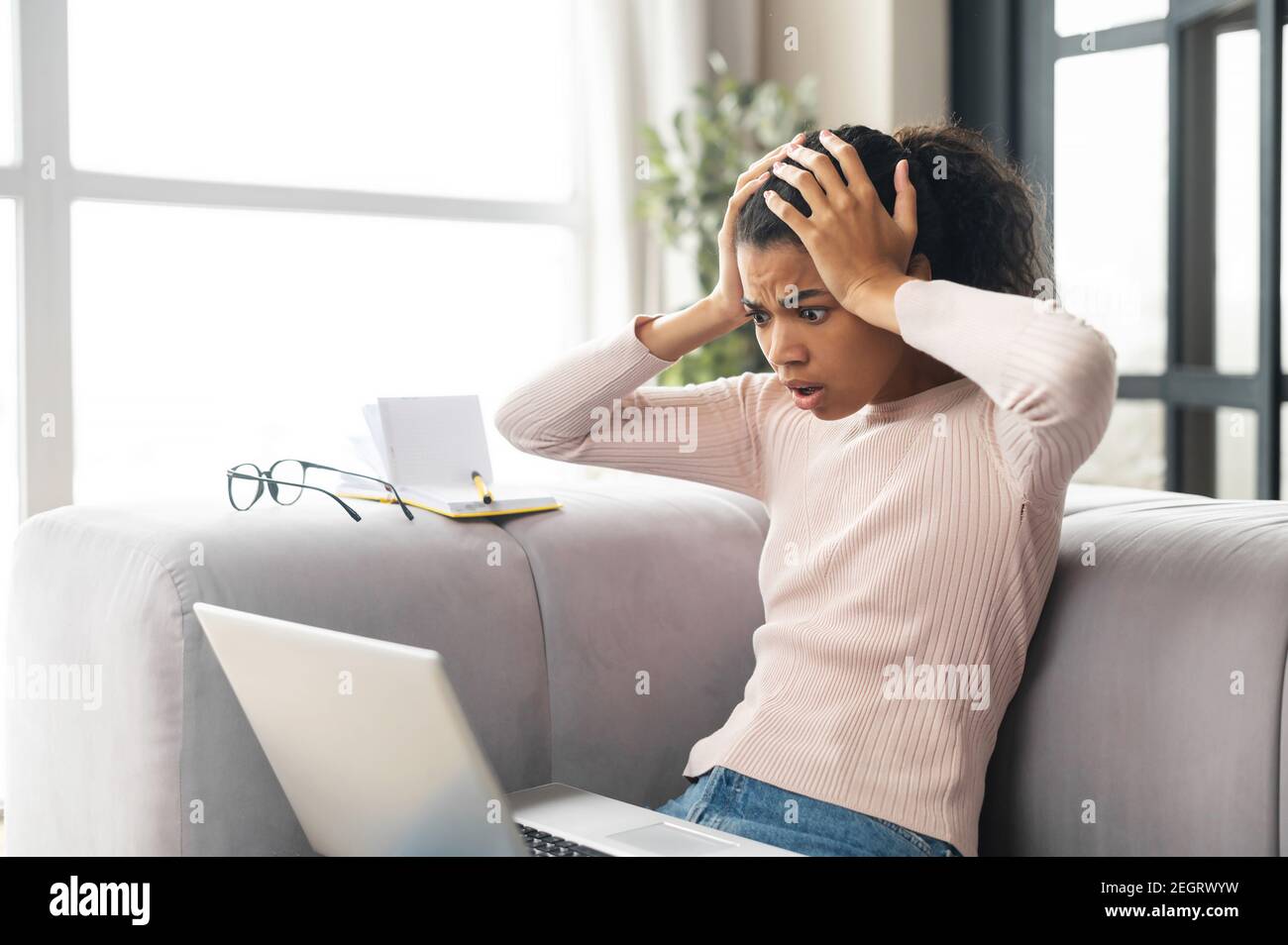 Young unproductive female remote hi-res stock photography and images ...