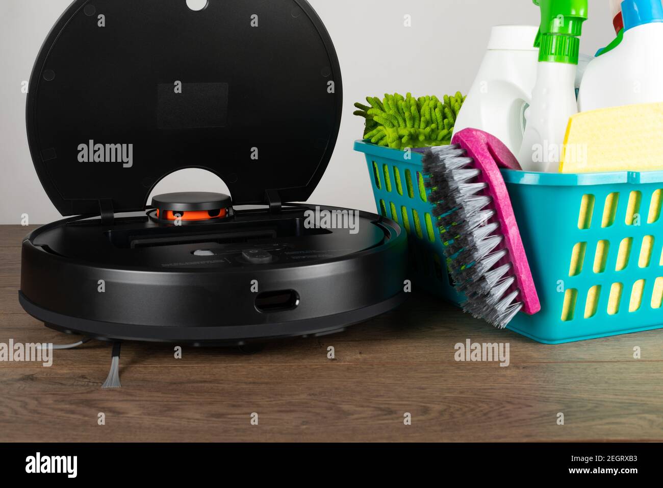 Picture of an automatic intelligent robotic vacuum cleaner and colorful ...