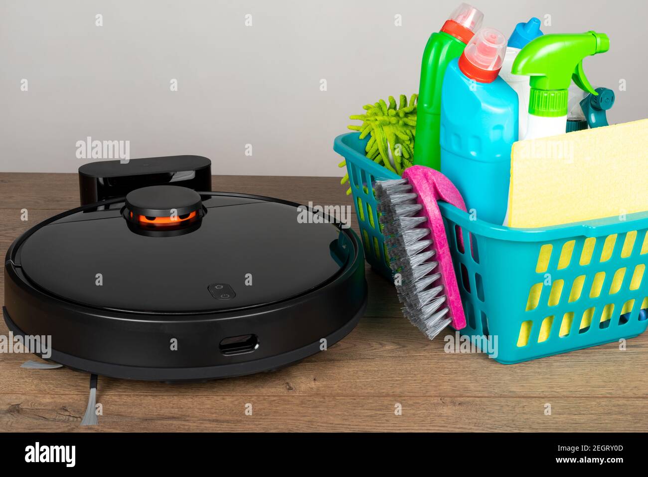 Picture of an automatic intelligent robotic vacuum cleaner and colorful ...