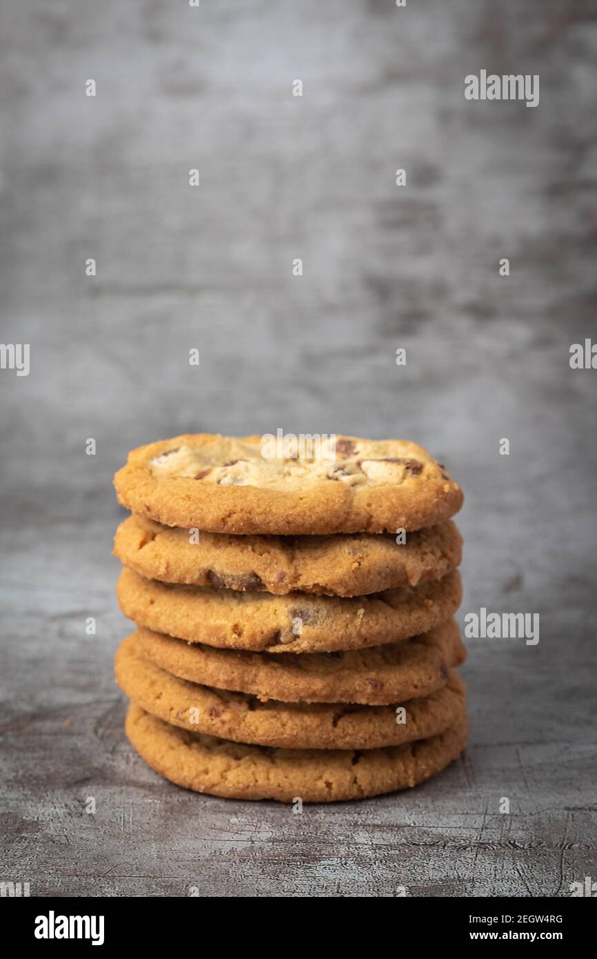 Cookies stacked with a neutral colored background Stock Photo - Alamy