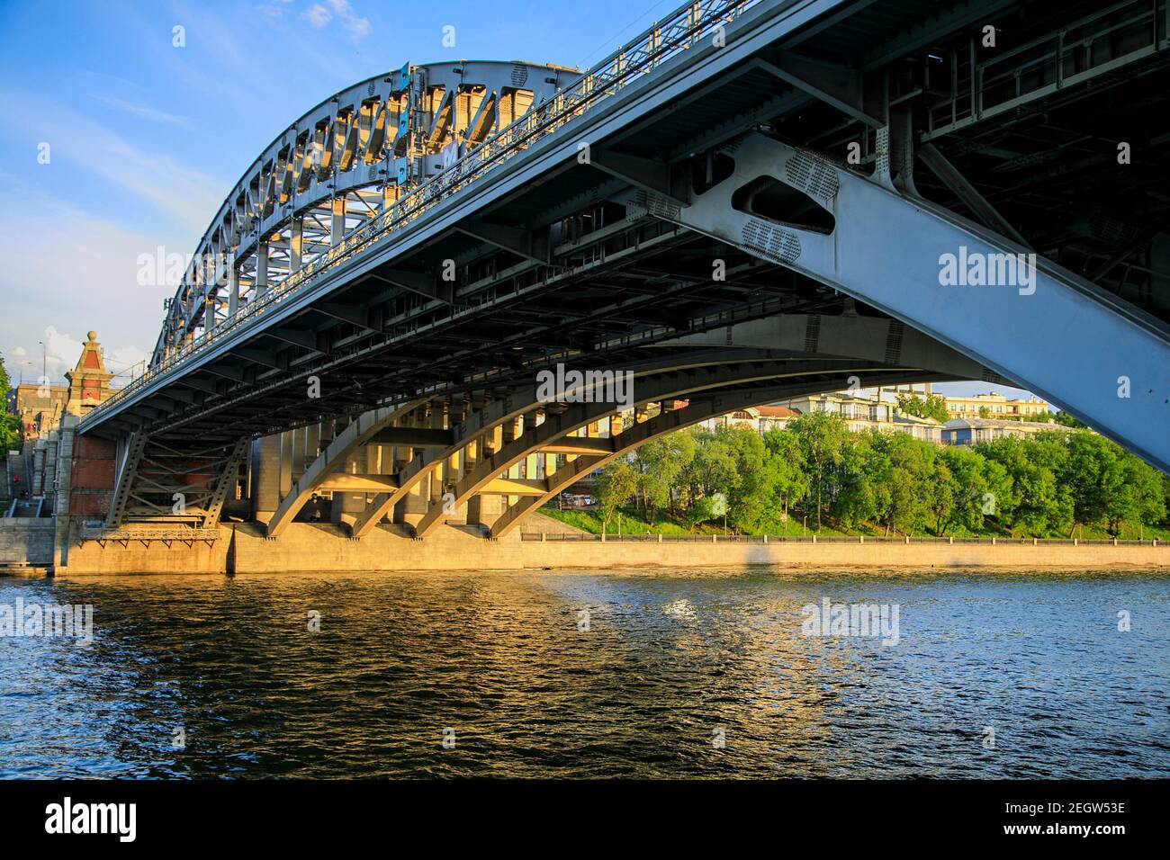 Powerful iron bridge structure, View from below. Concrete pillars, big ...