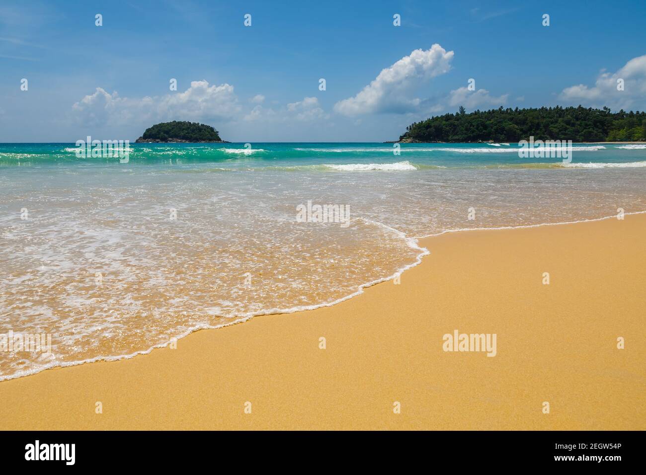 Beautiful sea Sunny landscape on the beach. Light waves of blue color ...