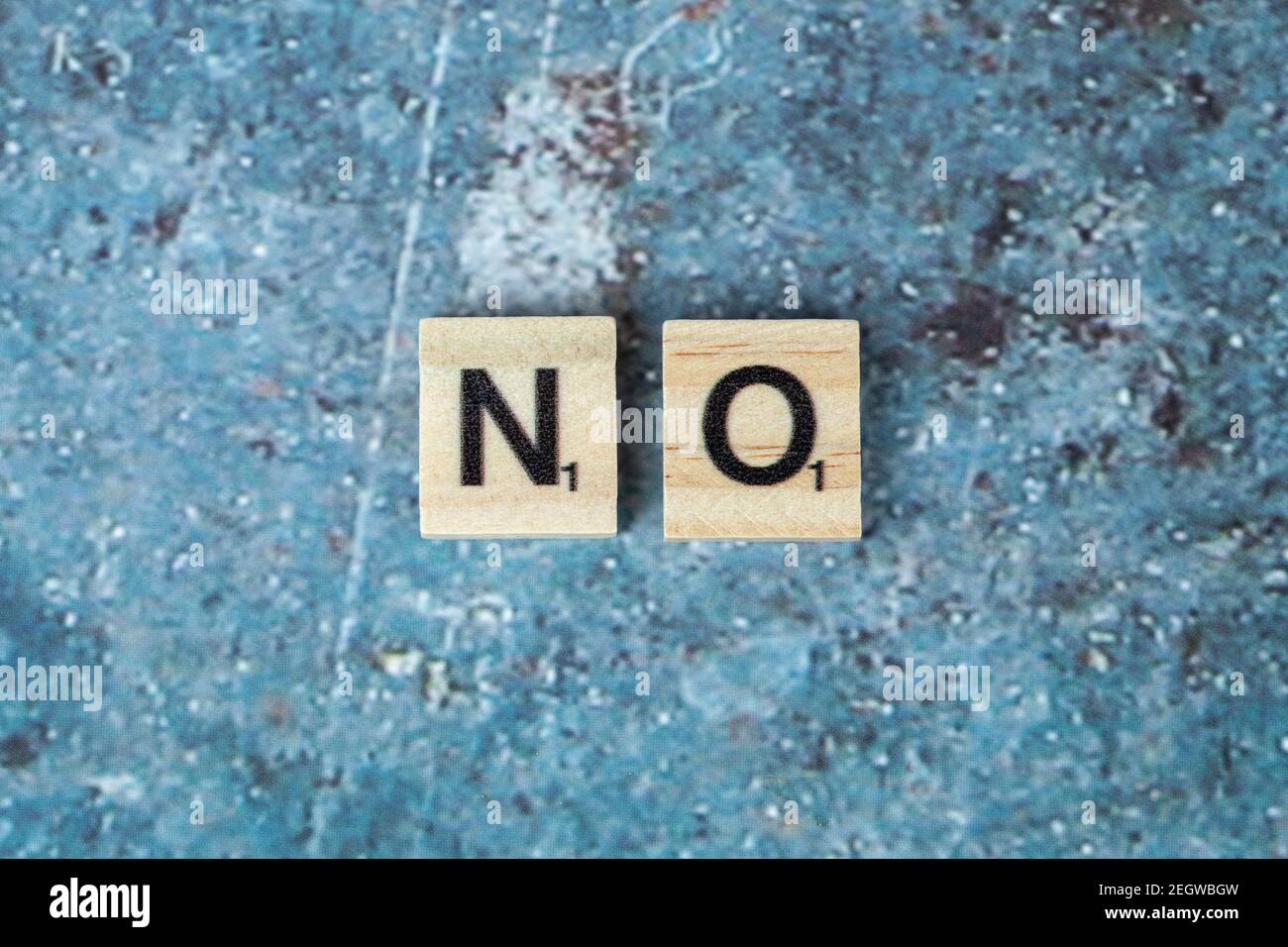 No symbolic writing with black letters on wooden dices in horizontal ...