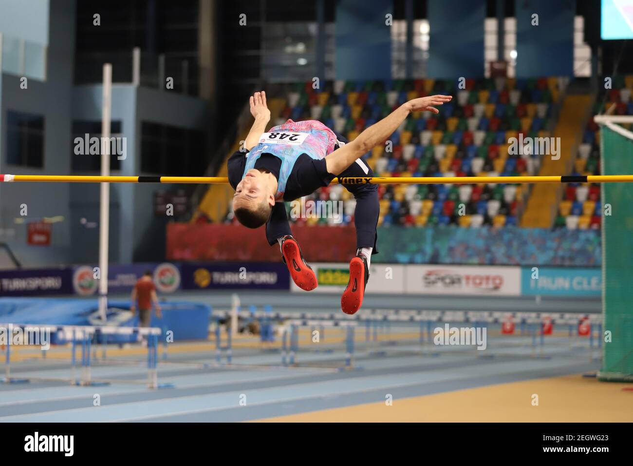 ISTANBUL, TURKEY - FEBRUARY 06, 2021: Undefined athlete high jumping ...