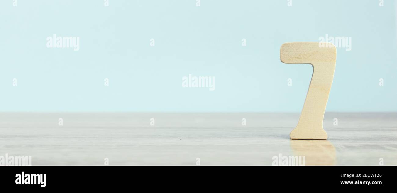 Wood Number 7 Seven On Table. Close-Up. Copy space Stock Photo - Alamy