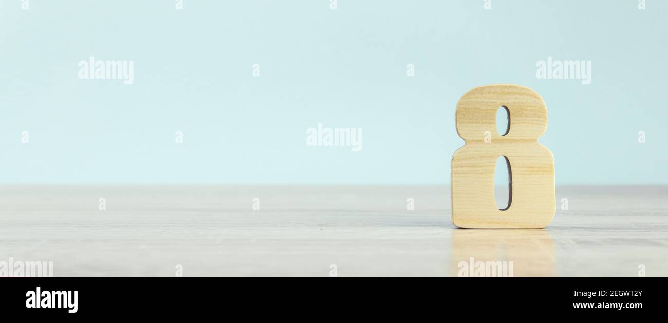 Wood Number 8 Eight On Table. Close-Up. Copy space Stock Photo - Alamy