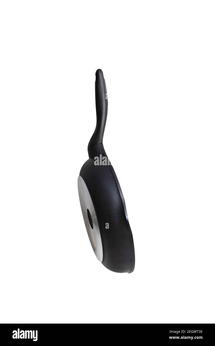 round frying pan side view isolated on white background Stock Photo - Alamy