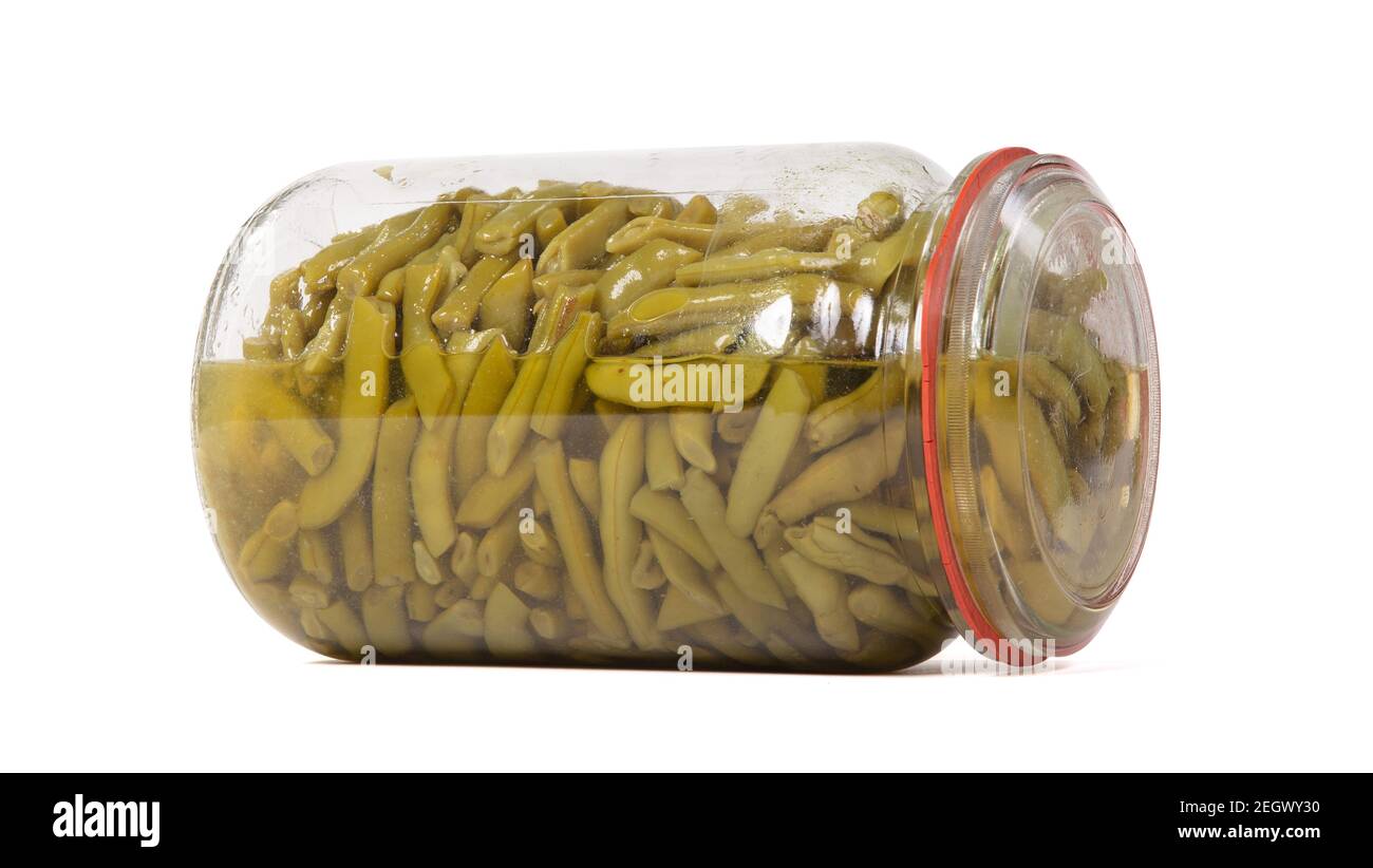 Very old glass jar with green beans, isolated on white Stock Photo - Alamy