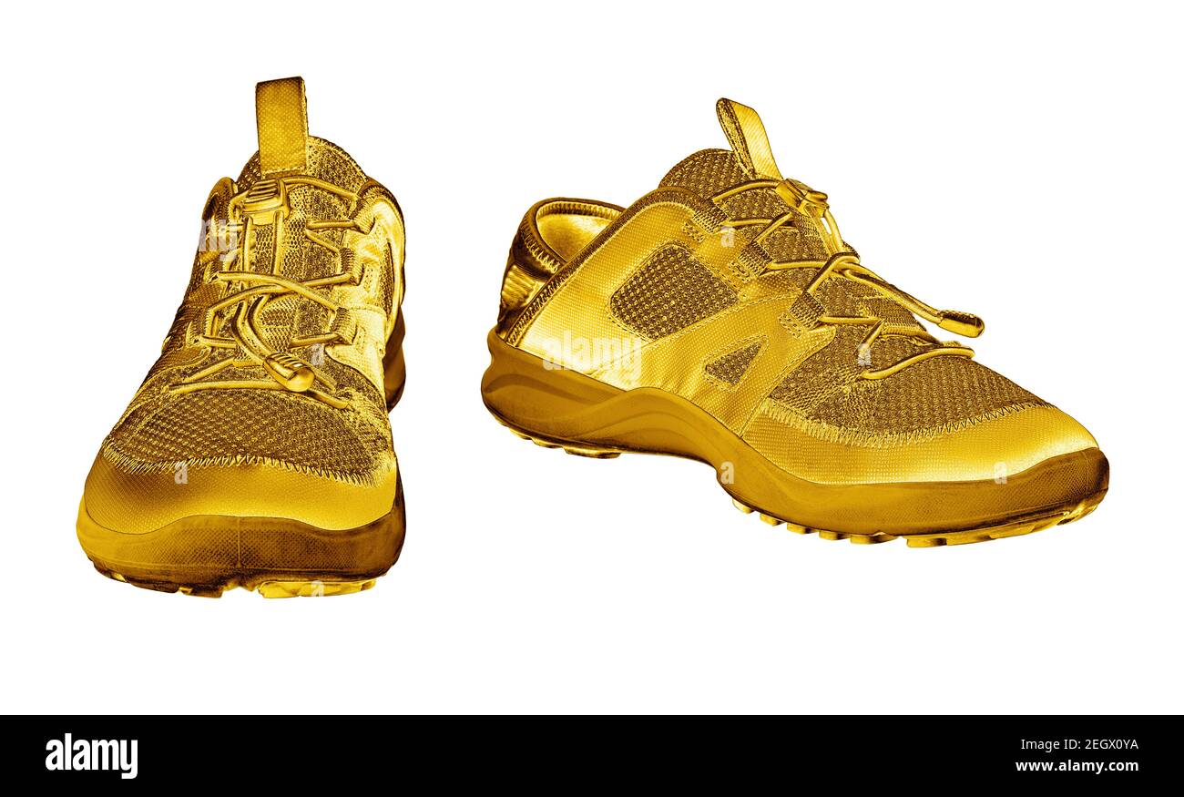 Golden sneakers white background isolated closeup, gold metal sport ...