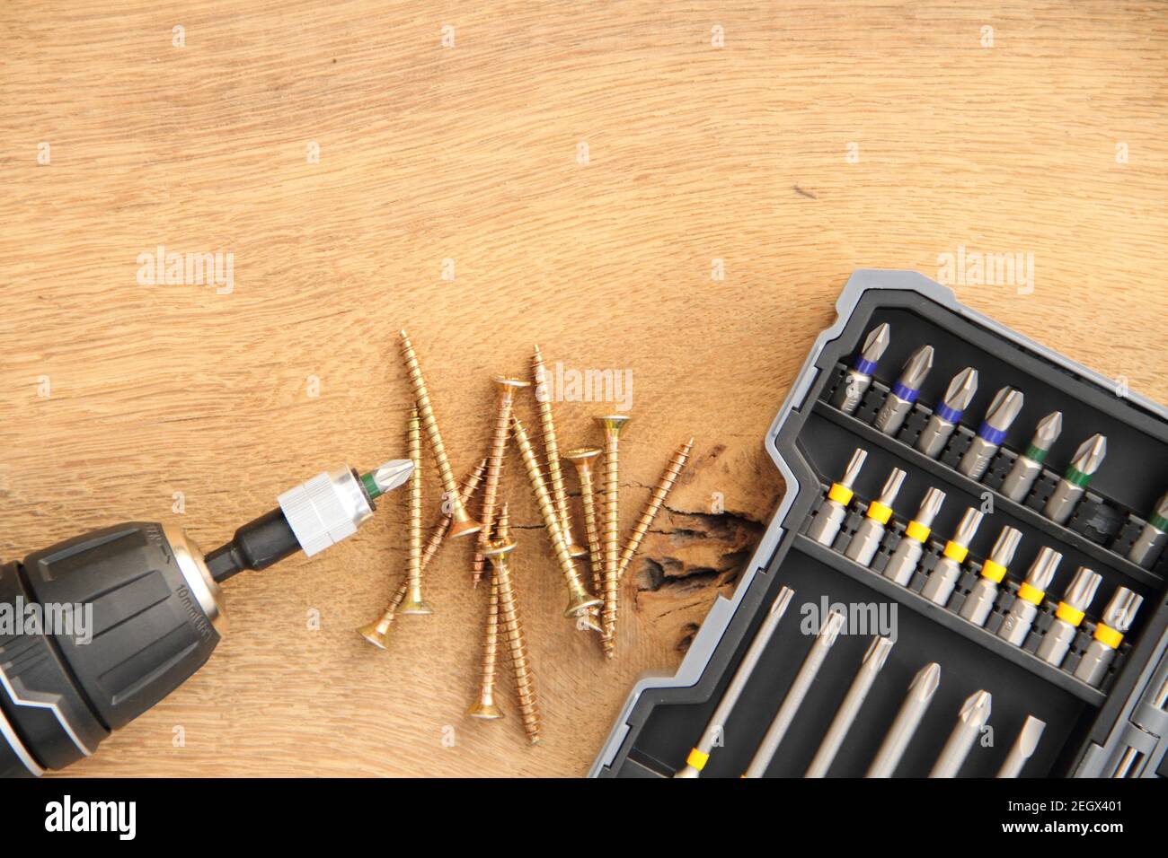 cordless screwdriver on a workbench Stock Photo - Alamy