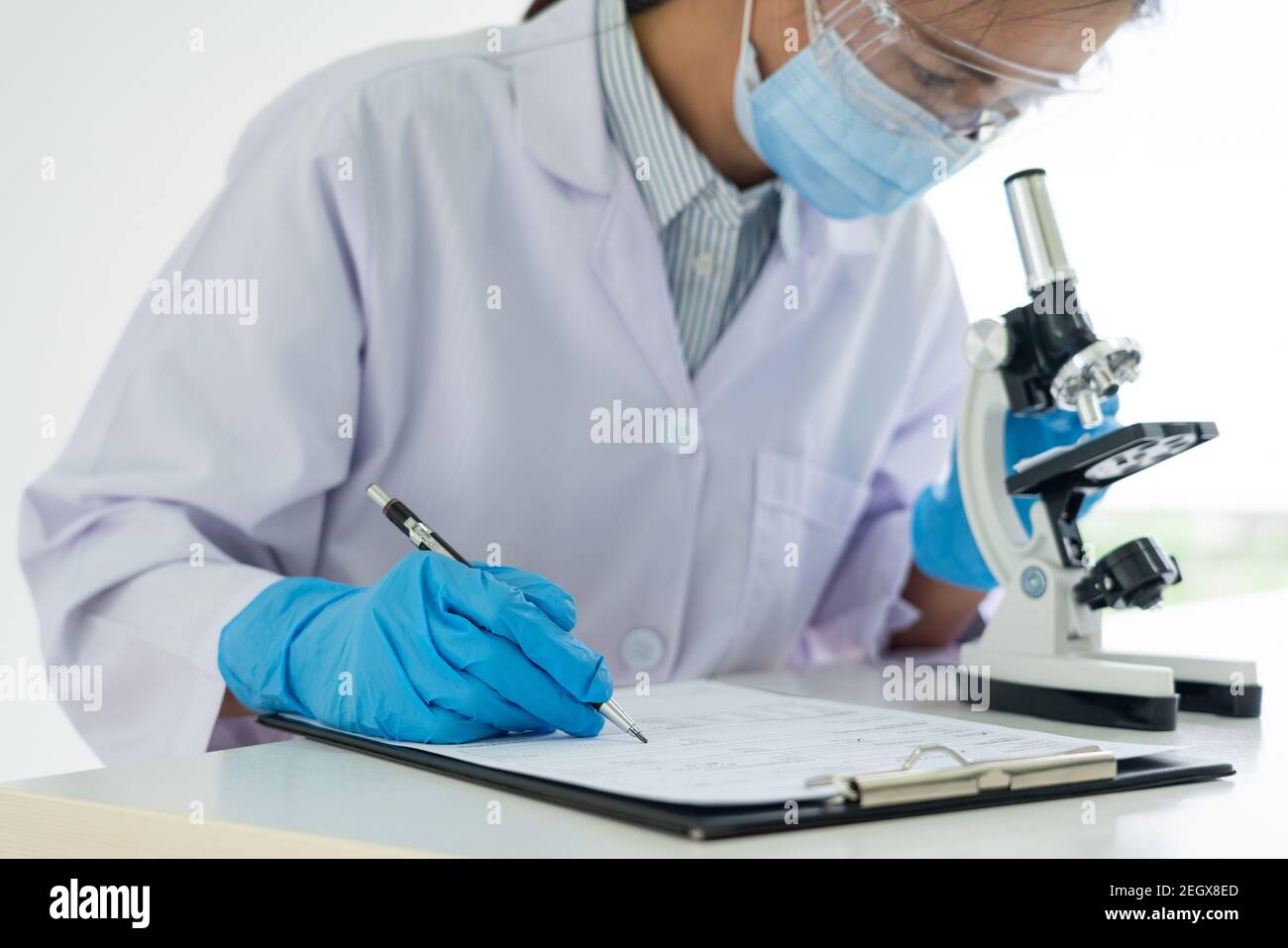 Forensic scientist analysing dna hi-res stock photography and images ...