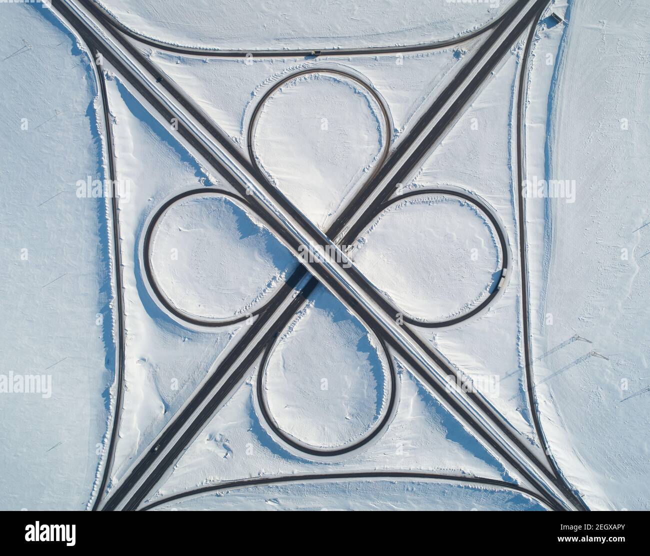 Clean highway road intersection in winter above drone top view Stock ...