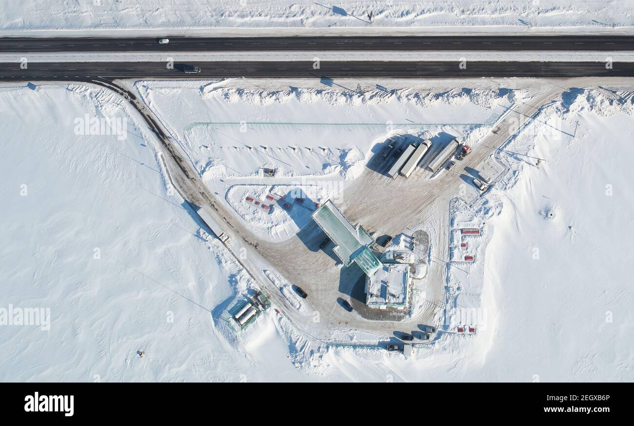 Gas station aerial above view in winter covered with snow time Stock ...