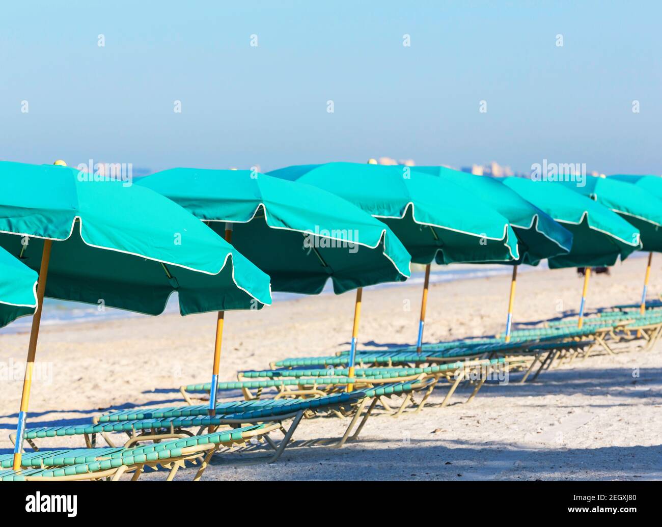 Luxury chairs on a sandy beach in ocean coast. Holiday and vacation ...