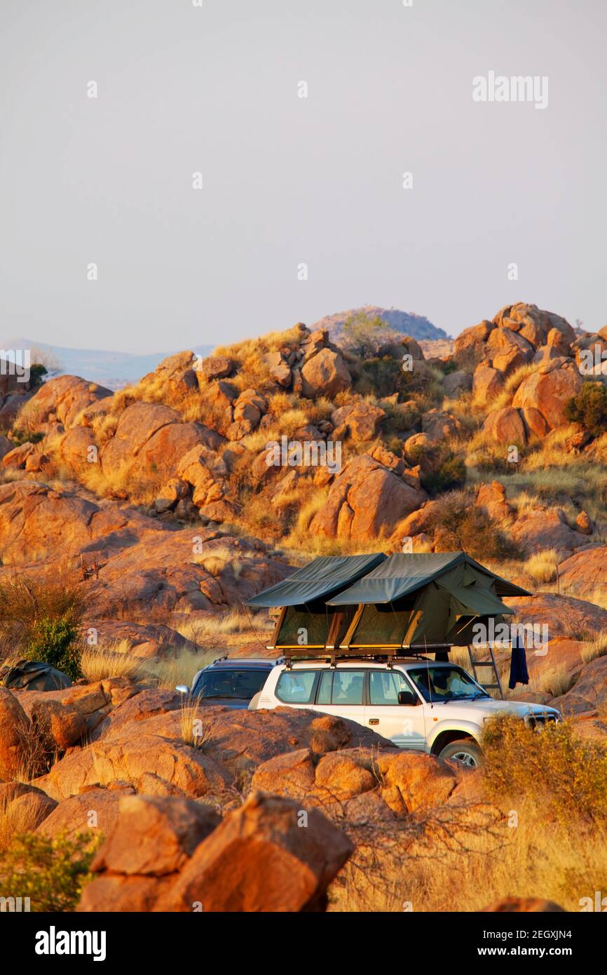 Offroad 4x4 vehicle with tent in the roof ready for camping in the ...