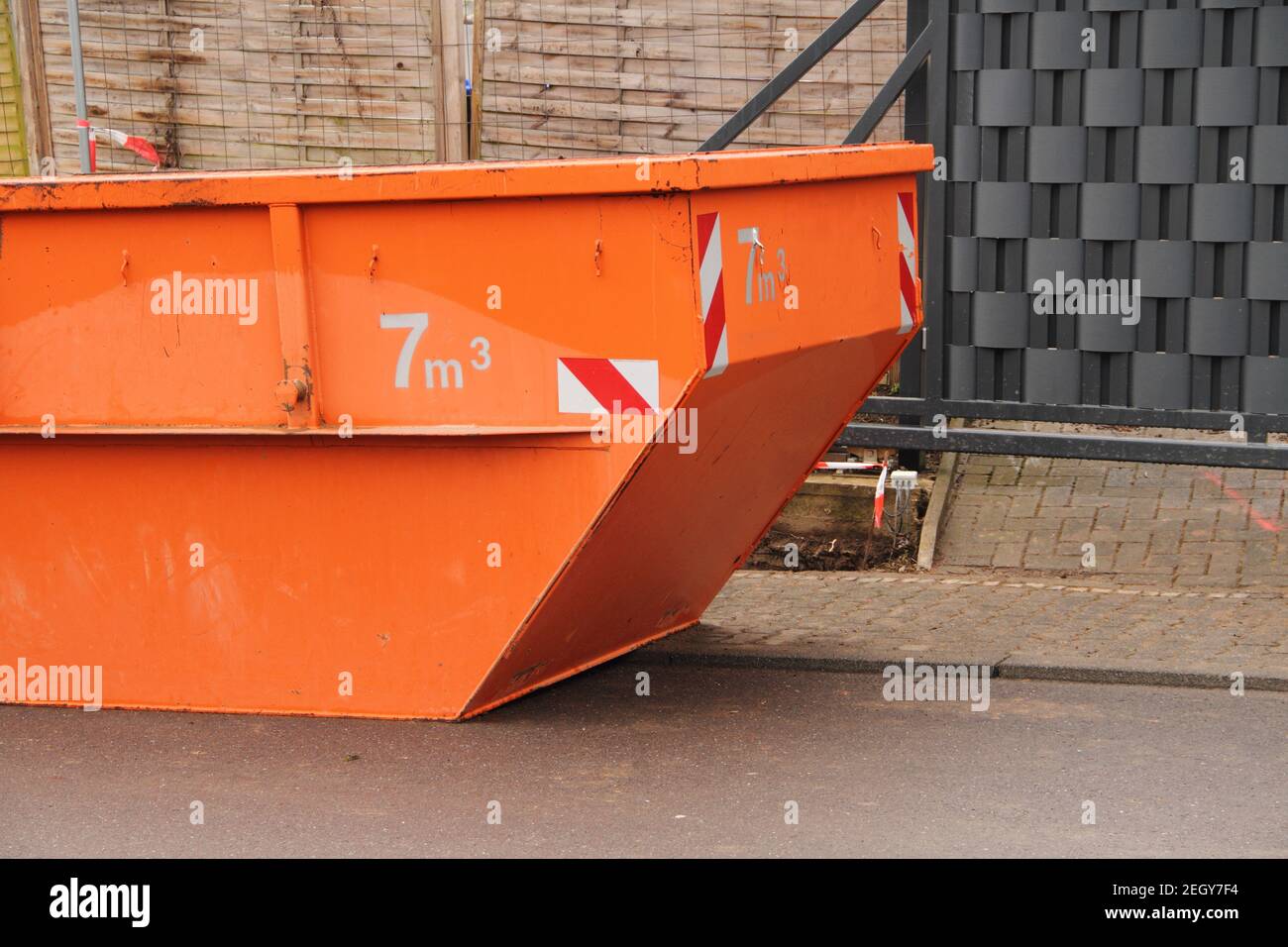 Construction dumpster on street hi-res stock photography and images - Alamy