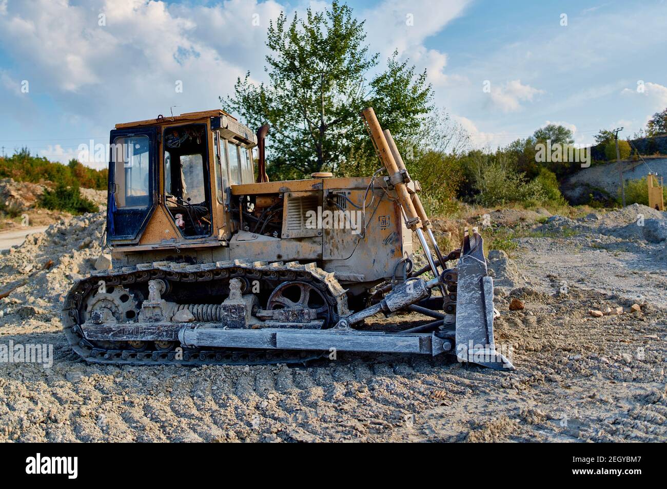 large bulldozer digging earth gravel and geology vehicle Stock Photo ...