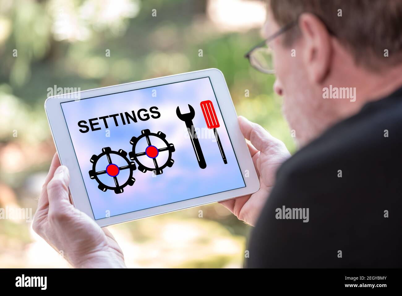 Tablet screen displaying a settings concept Stock Photo - Alamy