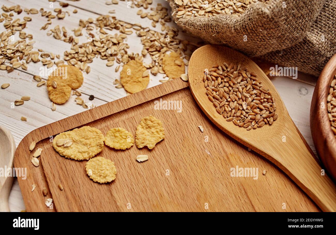 Whole grains cereals cereals wooden board table food preparation Stock ...
