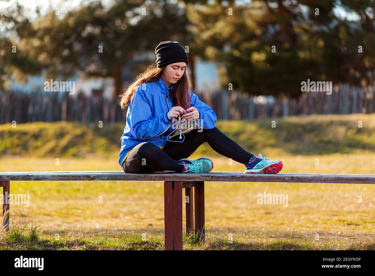Young woman feet on bench hi-res stock photography and images - Alamy