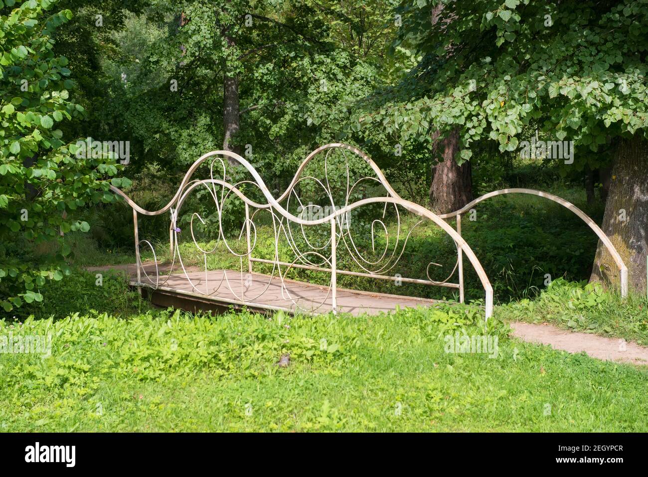 Iron metal bridge with patterned railings Stock Photo - Alamy