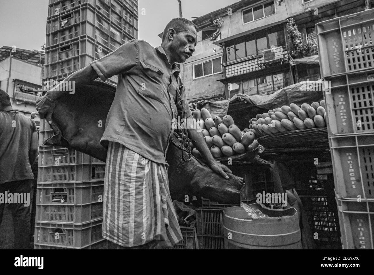 Bhisti water carriers of India Stock Photo - Alamy