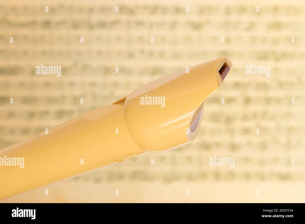 Closeup shot of a musical instrument flute on music manuscripts Stock ...