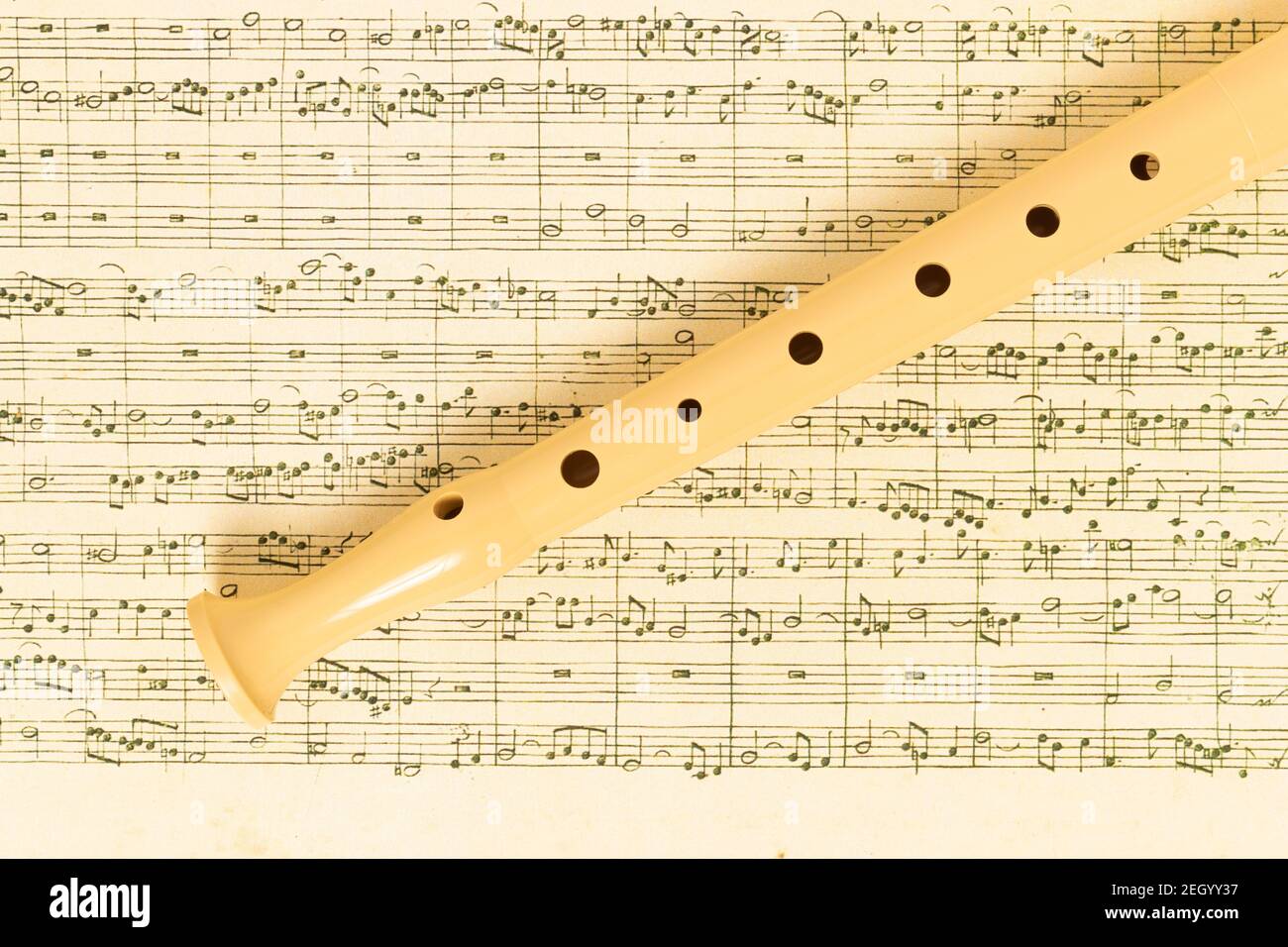 Top view of a musical instrument flute on music manuscripts Stock Photo ...