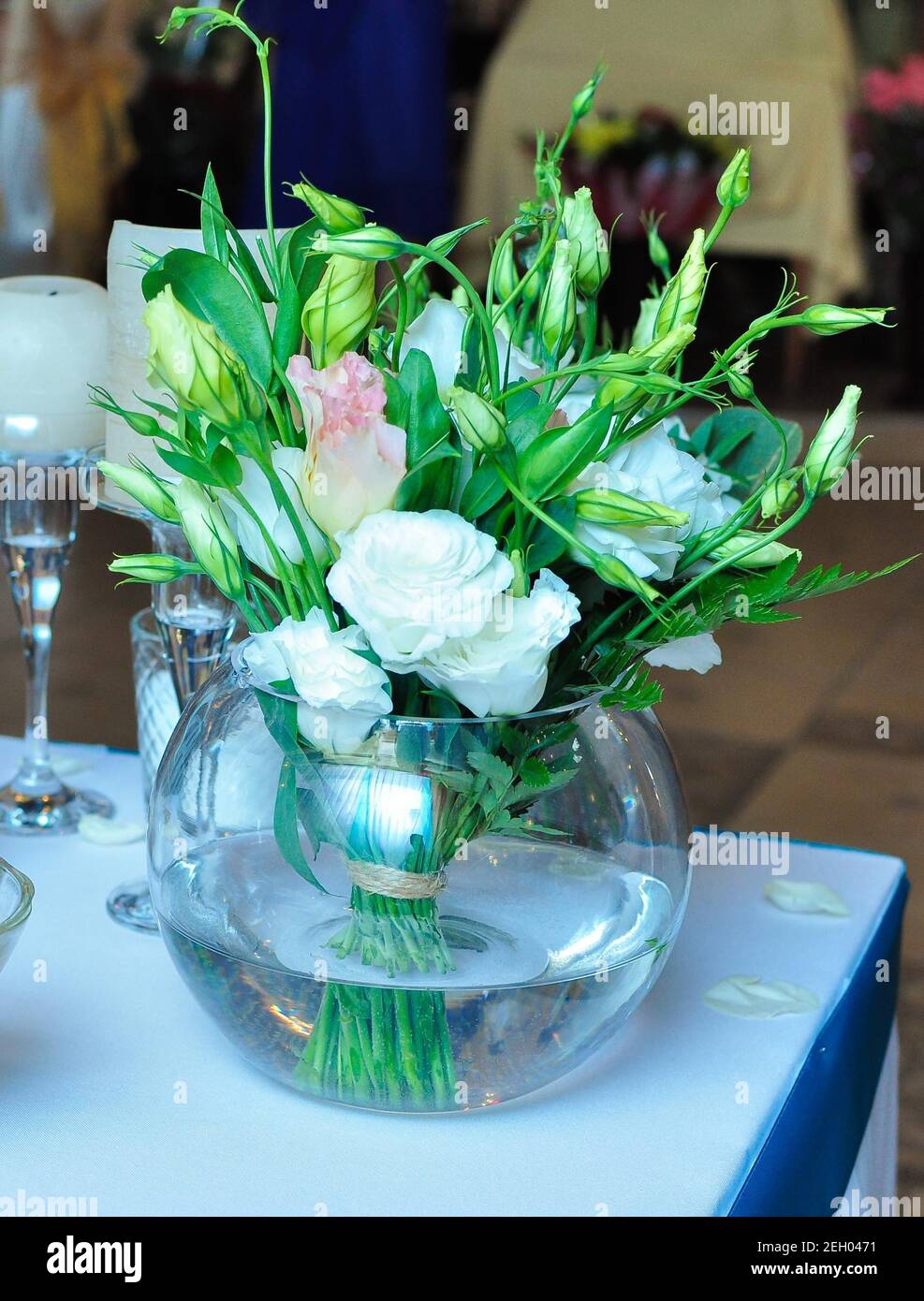 A bouquet of flowers in a large round aquarium Stock Photo - Alamy