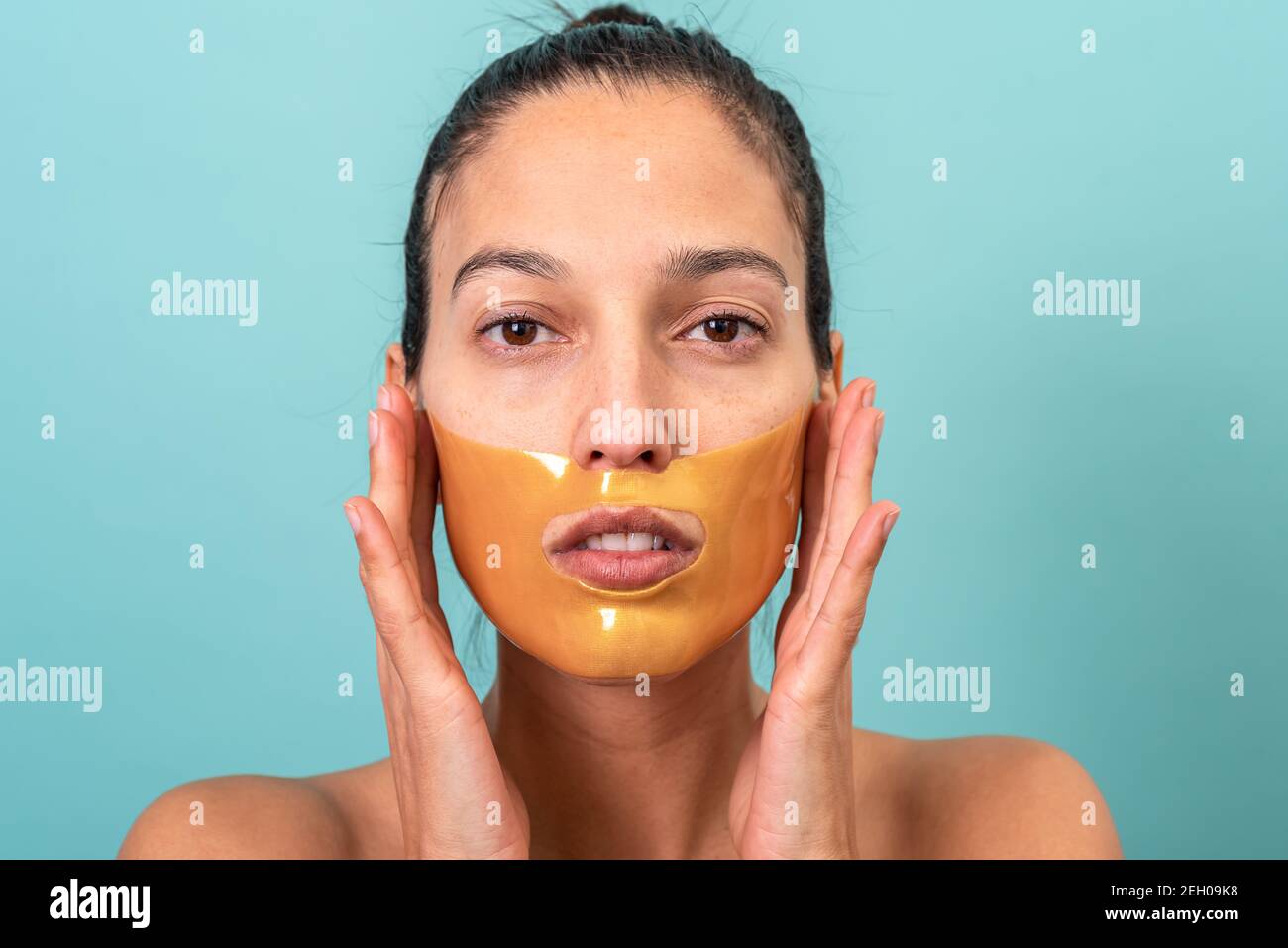 Beautiful woman using facial collagen gel skincare mask treatment Stock ...