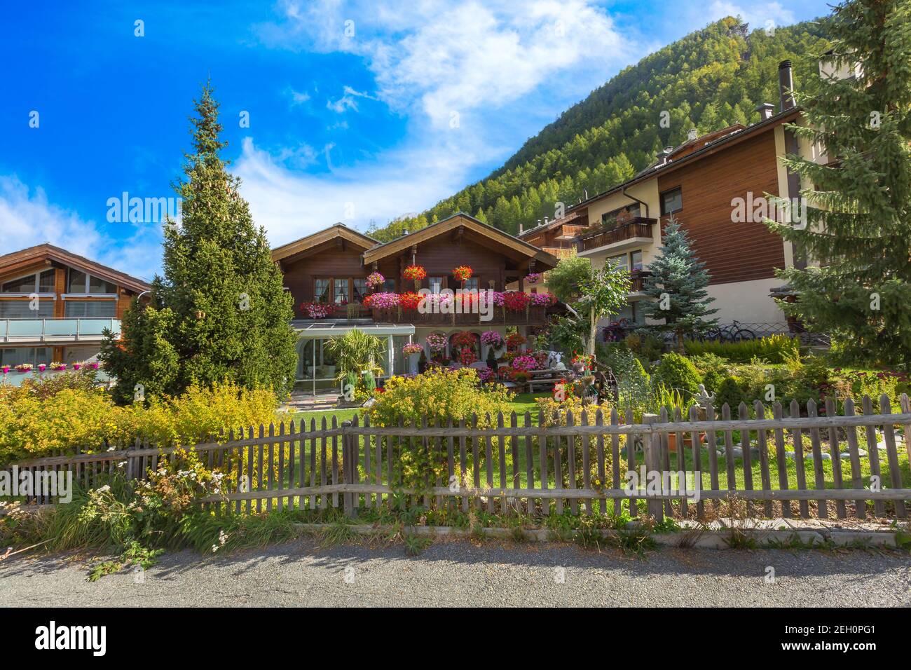 Houses decorated with flowers in Zermatt, alpine village, Switzerland ...