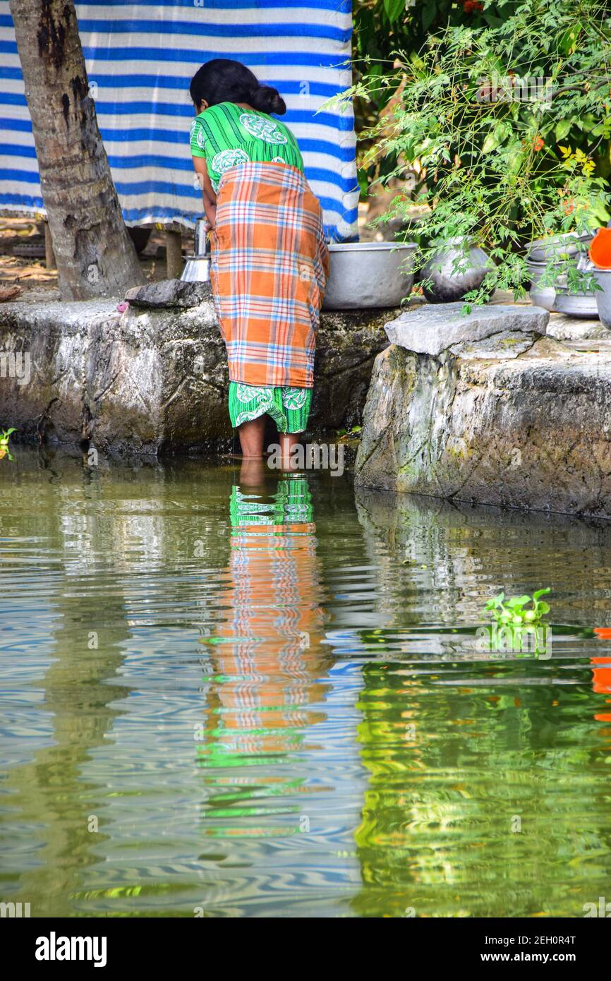 Washing Laundry, Kerala Backwaters, Kerala, India Stock Photo - Alamy