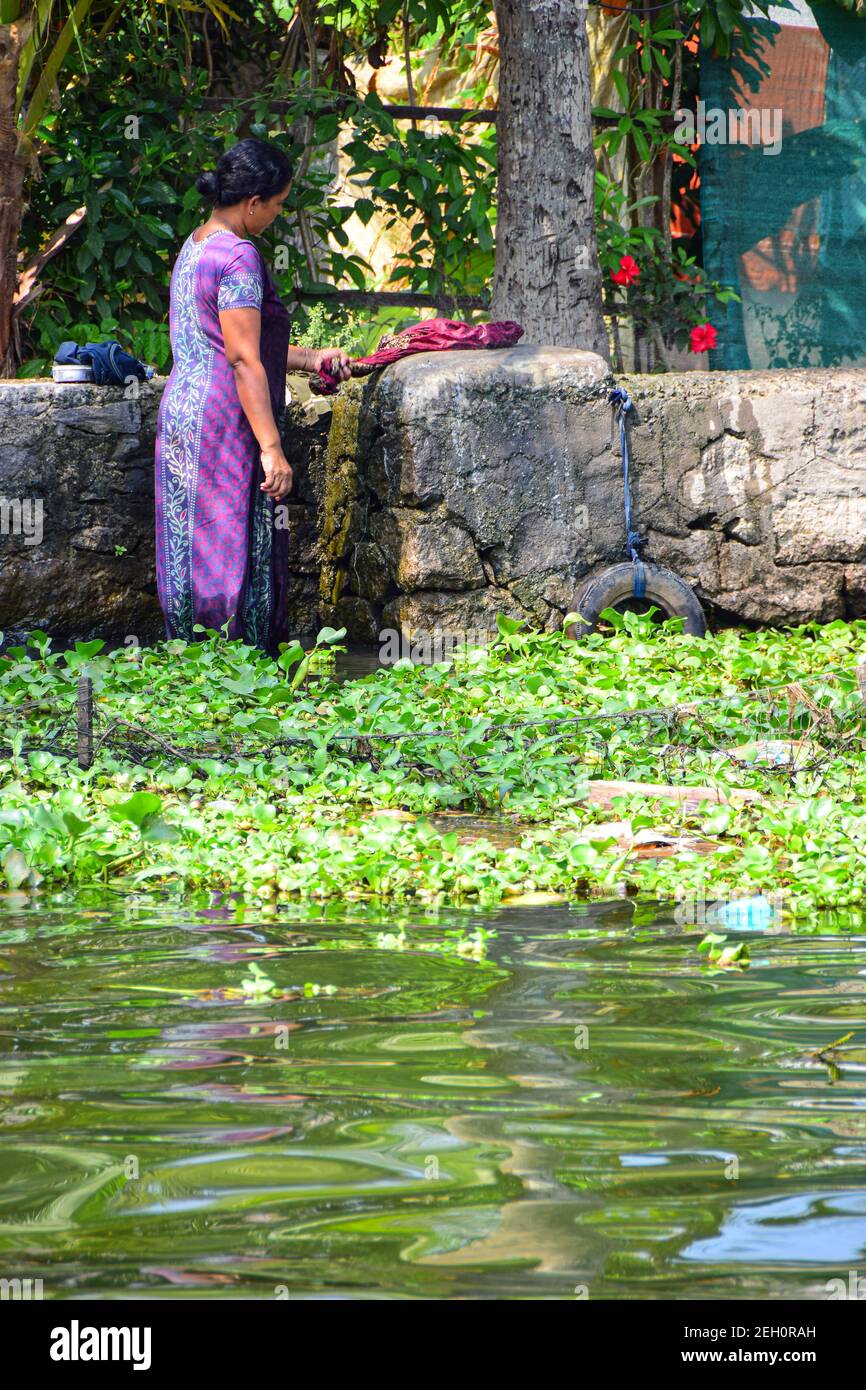 Washing Laundry, Kerala Backwaters, Kerala, India Stock Photo - Alamy