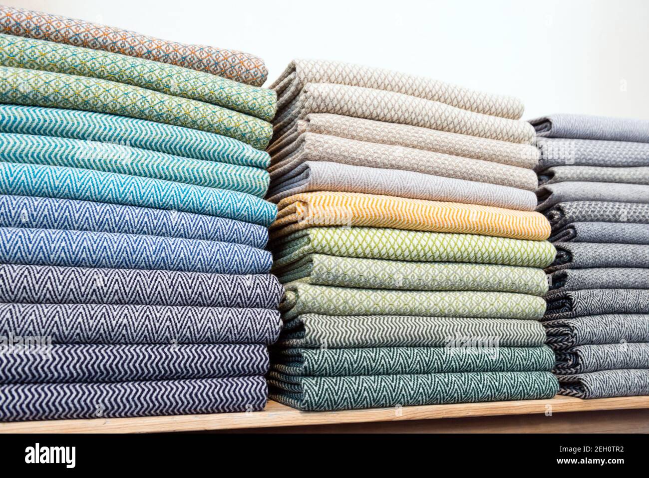 stacks of colorful fabrics Stock Photo - Alamy